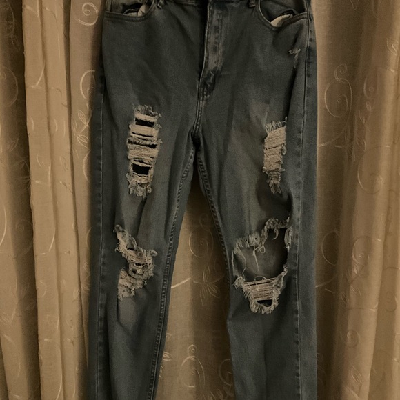 Bottoms | A Pair Of Lightwashed Blue Jeans With Rips Above The Knee ...